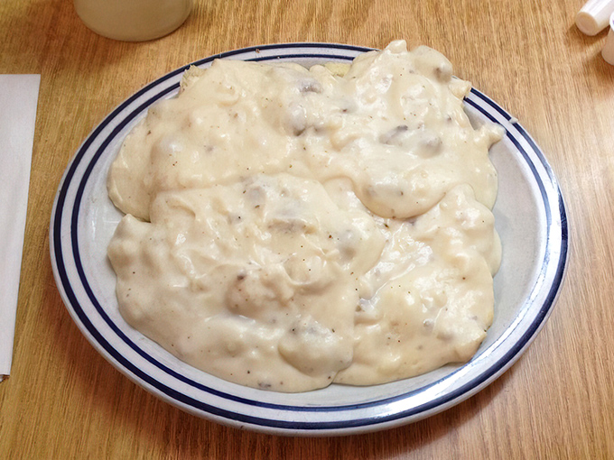 Behold the crown jewel of Southern breakfast: biscuits and gravy. This creamy, peppery masterpiece doesn't just stick to your ribs—it hugs your soul.
