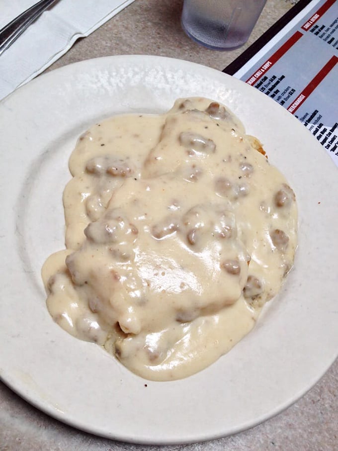 Biscuits drowning in creamy gravy – the kind of comfort food that makes your grandmother's cooking jealous.