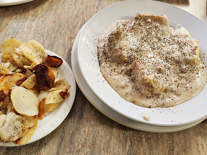 Biscuits and gravy—the breakfast that says "your cholesterol numbers are just suggestions" but your taste buds are screaming "worth it!"