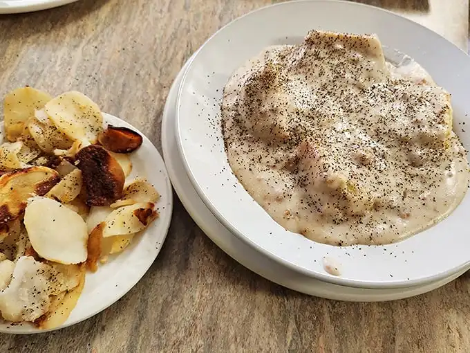 Biscuits and gravy—the breakfast that says "your cholesterol numbers are just suggestions" but your taste buds are screaming "worth it!"