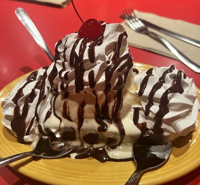 A mountain of whipped cream and chocolate sauce that doesn't just satisfy your sweet tooth – it throws a parade for it.