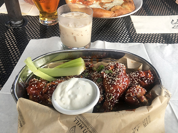 These wings aren't just tossed in sauce—they're having a full-on flavor spa treatment before meeting their delicious destiny.
