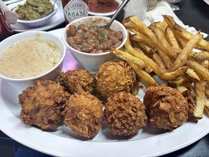 Golden-fried calf fries for the adventurous eater, served with crispy fries and beans—a Texas delicacy that's earned its loyal following.