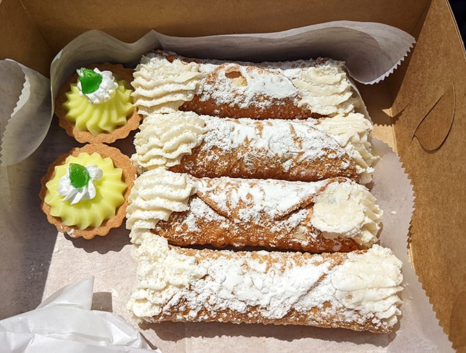 Cannoli so authentic they should come with their own passport – crisp shells filled with sweetened ricotta and topped with a dusting of powdered sugar.