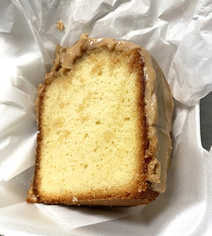That caramel cake slice proves dessert can be just as soul-stirring as the main event at this barbecue paradise.