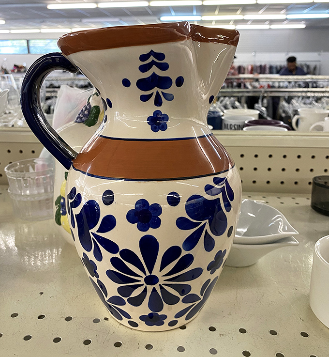 This blue and white ceramic pitcher isn't just kitchenware—it's a Mediterranean vacation for your dining table at a fraction of airfare.