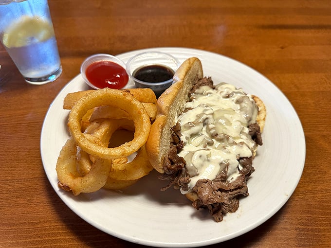 A French dip that would make a Parisian jealous. Those onion rings aren't just sides – they're crispy golden halos of happiness.