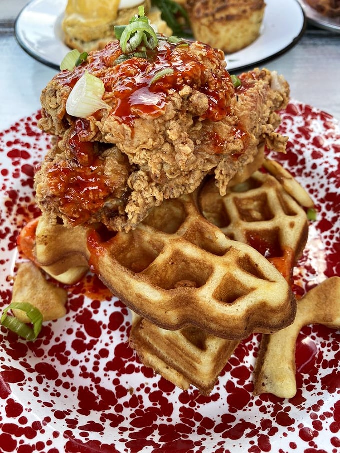 Chicken and waffles: the breakfast equivalent of a standing ovation. Crispy, saucy chicken perched atop golden waffles—comfort food that hugs your soul.