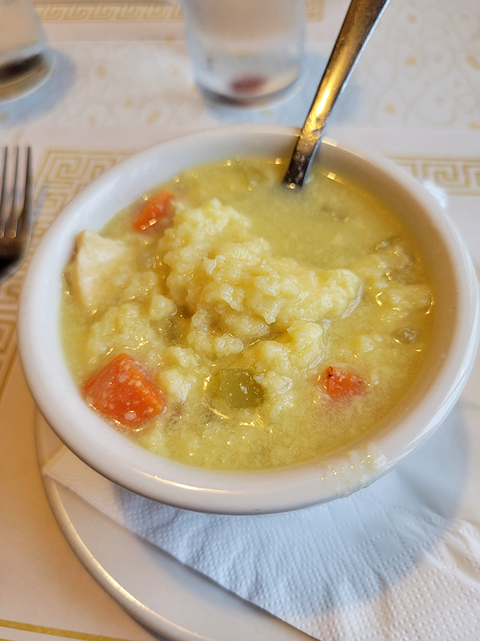 Fred's famous chicken dumpling soup—where fluffy dumplings float like clouds in a savory broth sea. Comfort in a bowl that grandmother would approve of.