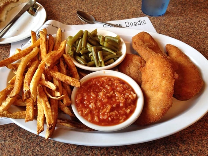 Barberton-style chicken with that signature hot sauce and crispy fries. This plate has solved more problems than most therapists.
