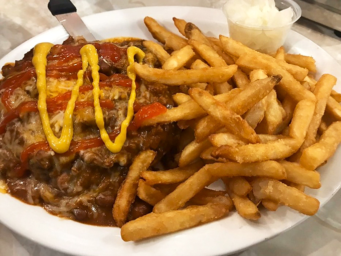 Chili, cheese, and a perfectly grilled burger—a trio more harmonious than The Supremes in their heyday.