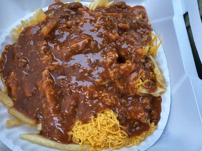 Chili cheese fries that could feed a small army while making your taste buds sing with pure, unadulterated joy.