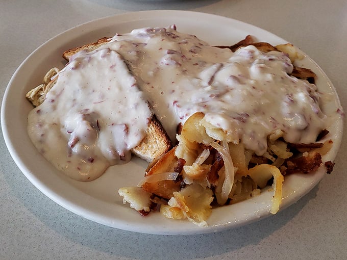 Creamy chipped beef cascading over toast—what grandparents affectionately called "S.O.S." but tastes like a warm hug on a cold morning.