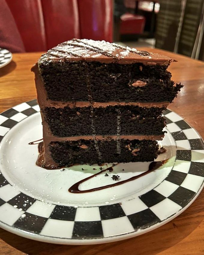 The Seriously Big Chocolate Cake lives up to its name – three towering layers of chocolate decadence that would make Willy Wonka jealous.
