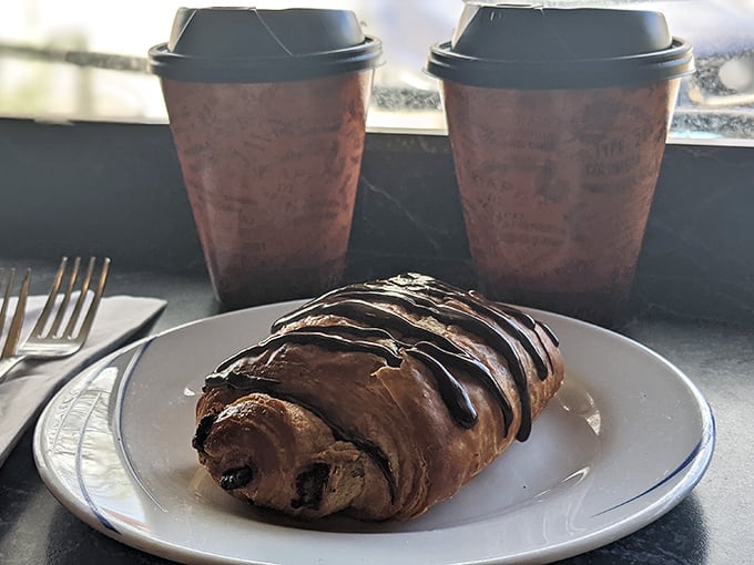 The chocolate croissant and coffee duo – proof that sometimes the best relationships are the simplest ones. Name a more iconic pair. I'll wait.