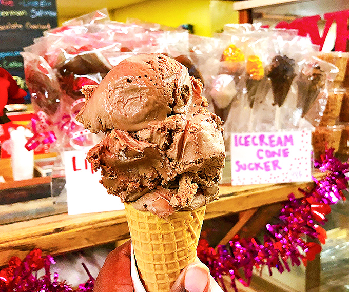 Ice cream scooped with conviction, not hesitation. This chocolate masterpiece in a waffle cone is what childhood dreams are made of.