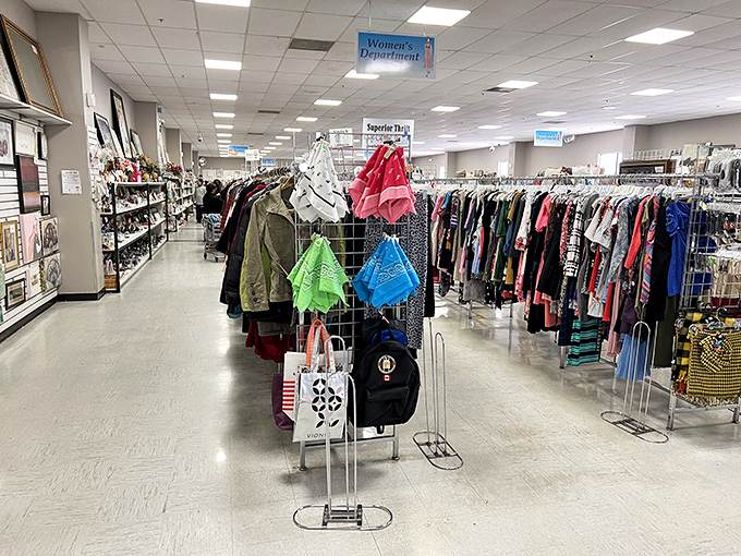 Color-coded clothing racks create a rainbow road of retail therapy. The thrill of the hunt is half the fun.