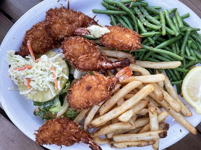 The star attraction in all its coconut-crusted glory – these shrimp are what food photographers dream about and seafood lovers drive miles to devour.
