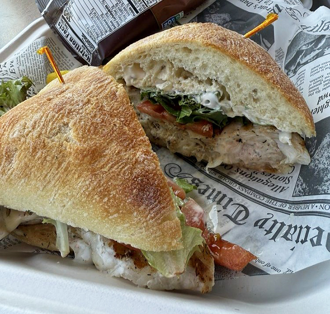 The golden-toasted sourdough embraces seafood like it was born to do just that—a sandwich that makes ordinary lunch weep with inadequacy.