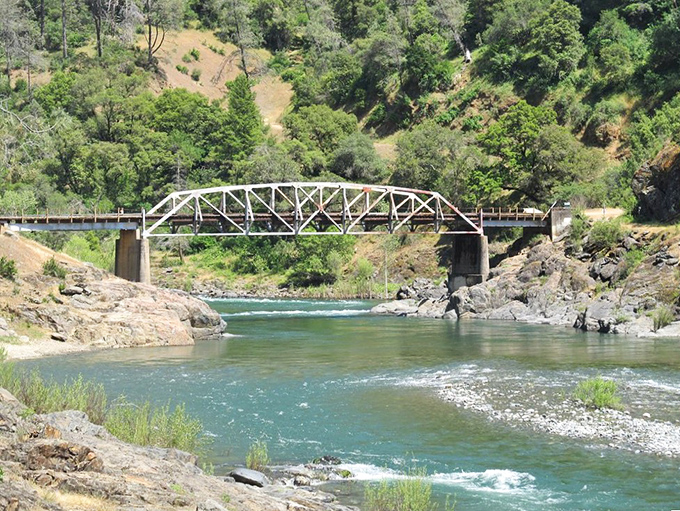At Codfish Creek Trail, the bridge isn't just crossing water—it's spanning centuries, connecting modern visitors to Gold Rush adventurers.