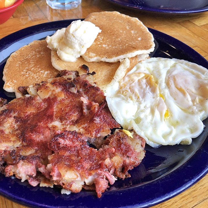 Corned beef hash with pancakes and eggs—the breakfast equivalent of hitting the jackpot at a Tahoe casino, but tastier.
