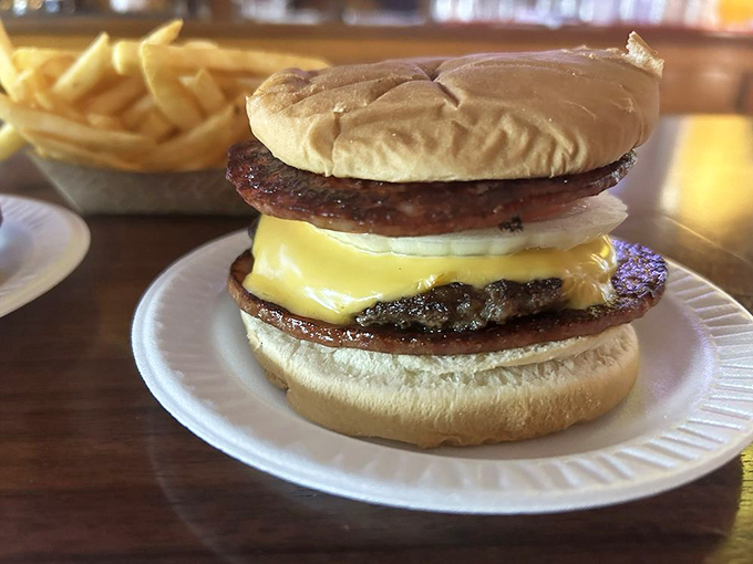 The Cowboy Burger doesn't mess around—stacked with bologna and beef patty, it's what happens when two menu stars join forces.