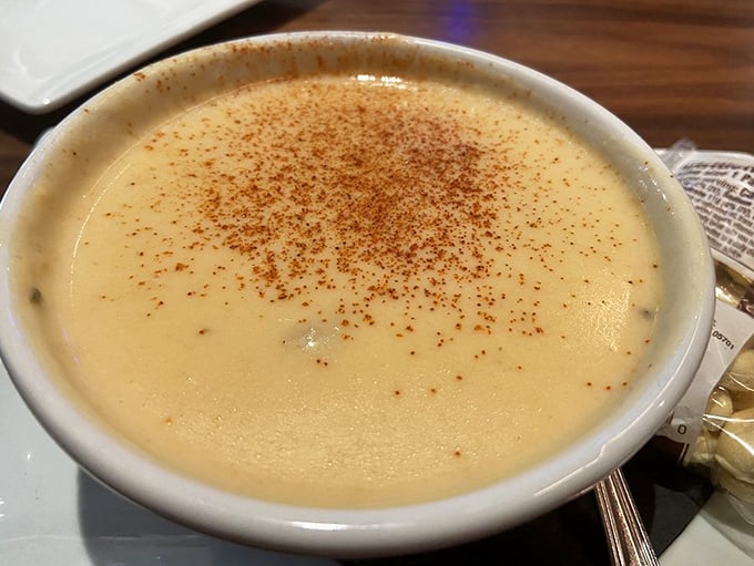 This isn't just soup—it's liquid gold with a sprinkle of spice. The kind of bisque that makes you consider drinking straight from the bowl.