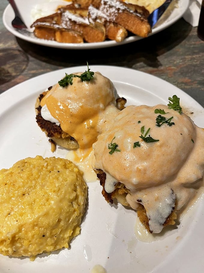 These crab cakes benedict aren't just breakfast, they're an event—golden patties crowned with poached eggs and hollandaise that's sunshine on a plate.