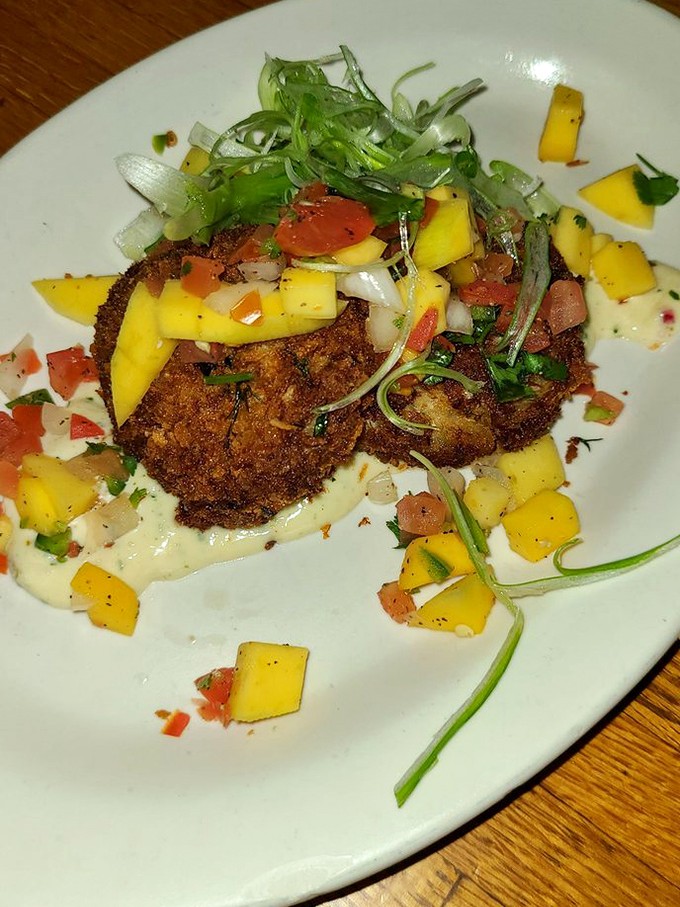 Crispy outside, tender inside—these crab cakes with mango salsa deliver a California sunset on a plate. Worth every calorie.