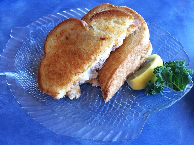 The humble grilled cheese gets a coastal makeover that would make mermaids weep. Toasty bread, melty cheese, and seafood—comfort food that graduated with honors.