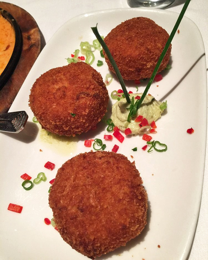 Golden-brown crab cakes that actually contain crab—revolutionary concept! These beauties are what Maryland dreams about when it visits San Francisco.