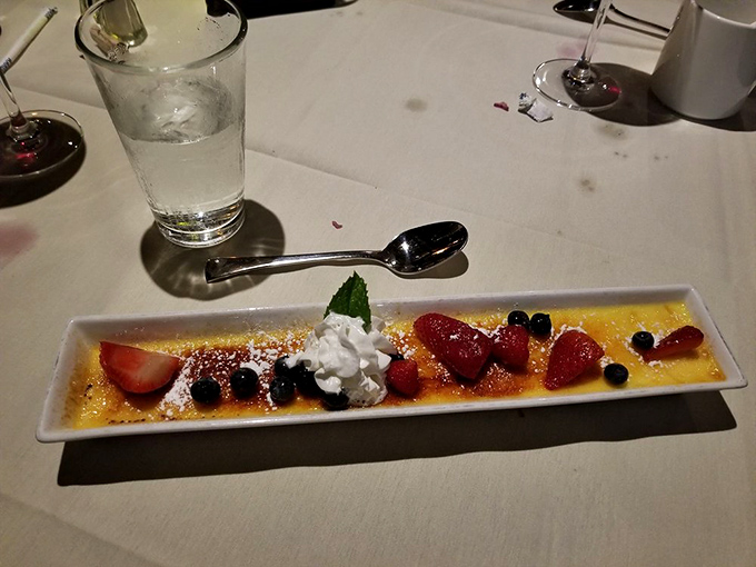 Crème brûlée with berries: where the crack of caramelized sugar sounds like a standing ovation for your taste buds.