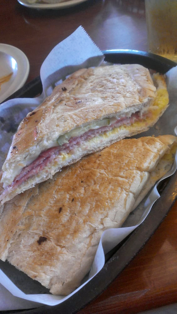 The Cuban sandwich—Florida's gift to the culinary world. Pressed to perfection with ham, cheese, and pickles creating a symphony of flavors.