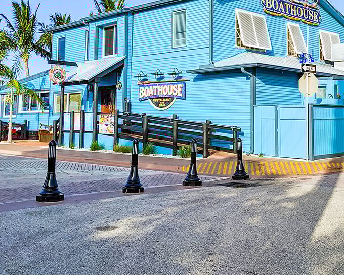 The Boathouse's Caribbean blue exterior isn't just a color choice – it's Stuart's visual promise that seafood and water views come standard with every visit.