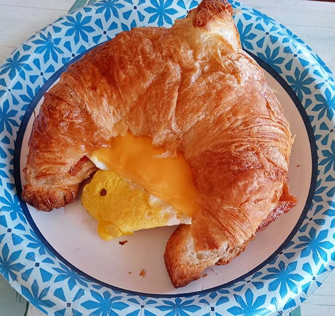 This croissant breakfast sandwich proves that sometimes the best things in life are indeed flaky, buttery, and filled with perfectly cooked eggs.