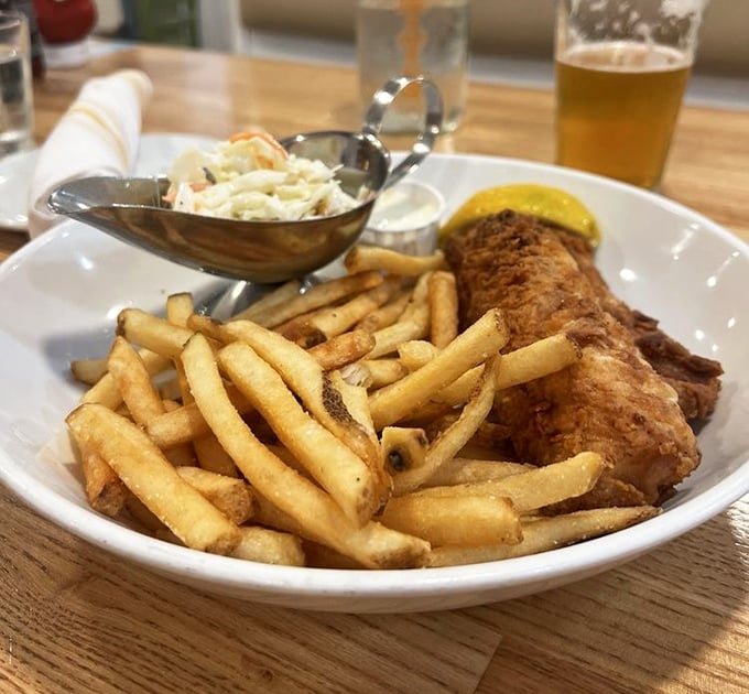 Fish and chips that would make a British pub jealous—crispy, flaky, and demanding to be devoured before the Atlantic tide changes.