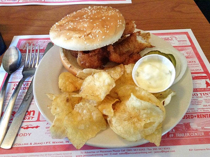The fish sandwich that launched a thousand road trips. Notice how it proudly extends beyond its bun borders—a fish that refuses to be contained by bread alone.