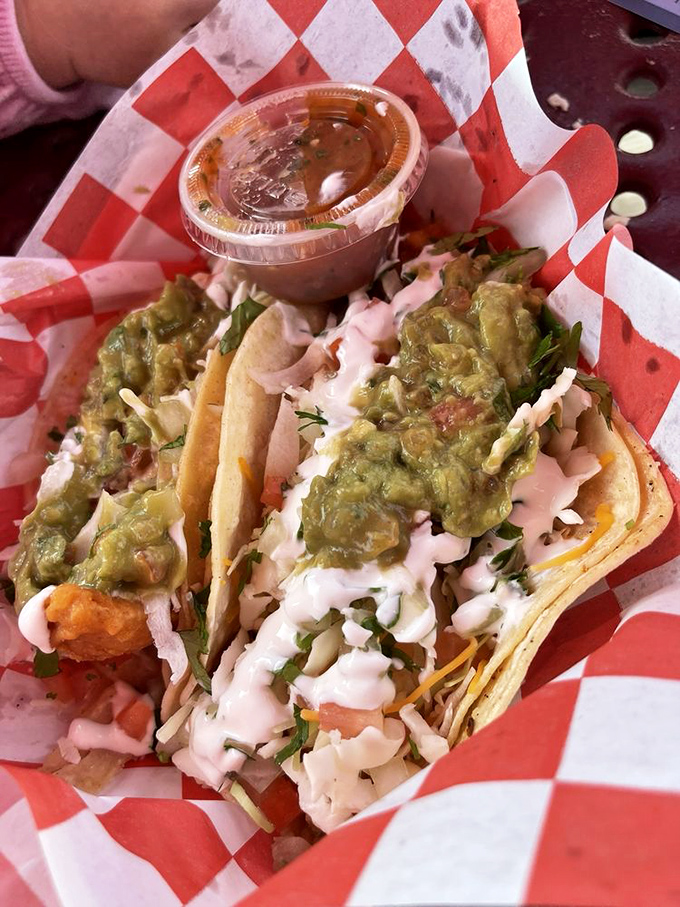 Fish tacos that make you question all other tacos you've ever known. That green avocado sauce isn't just a topping—it's a game-changer.
