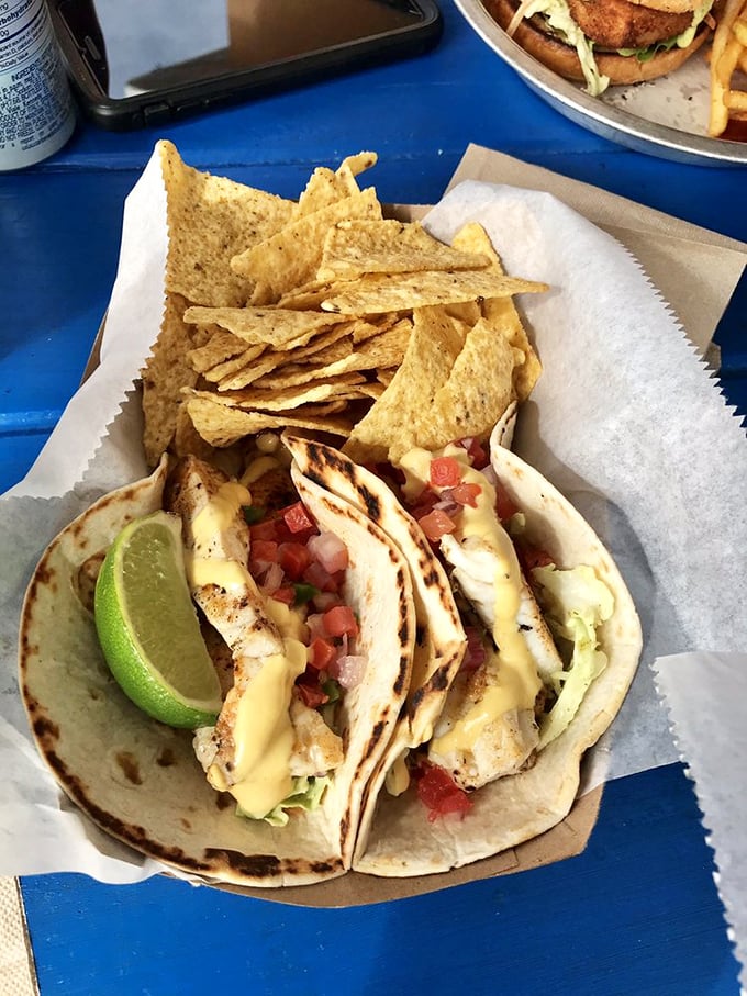 Fish tacos that make you question why you'd ever eat anything else. That lime wedge isn't just garnish—it's the perfect finishing touch.