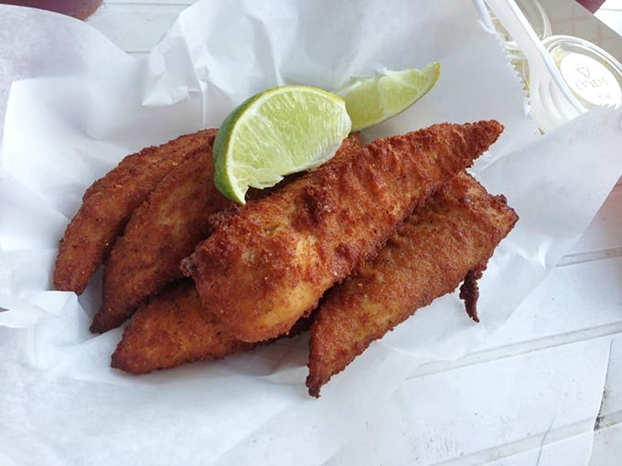 Fried fish fingers that would make Captain Birds Eye weep with jealousy. Crispy outside, flaky inside, and that squeeze of lime seals the deal.