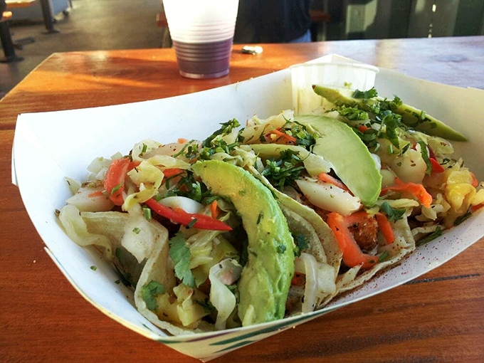 These fish tacos aren't just a meal; they're a California dream wrapped in a tortilla, where fresh seafood meets vibrant veggies.