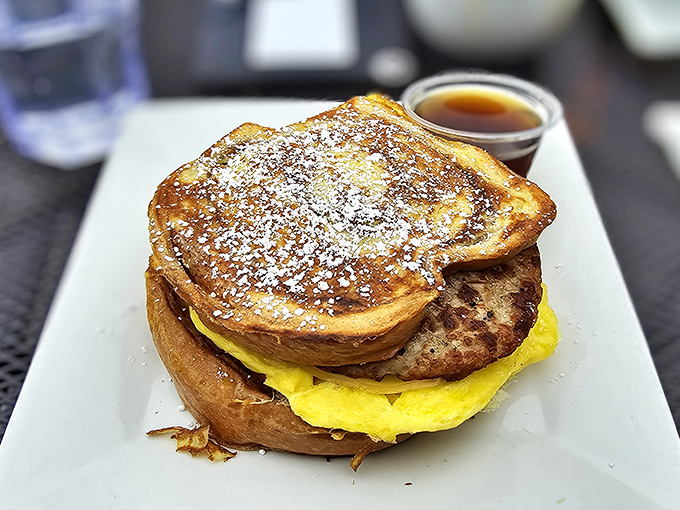 French toast that would make actual French people jealous. Dusted with powdered sugar and served with maple syrup, it's breakfast masquerading as dessert—and we're not complaining.