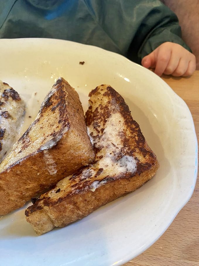 French toast that's achieved that mythical balance—crispy exterior, custardy interior. The breakfast equivalent of winning the lottery.