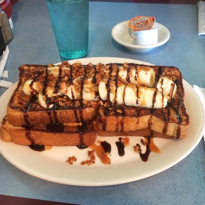 French toast that's dressed for success with bananas and chocolate – breakfast that moonlights as dessert without apology.