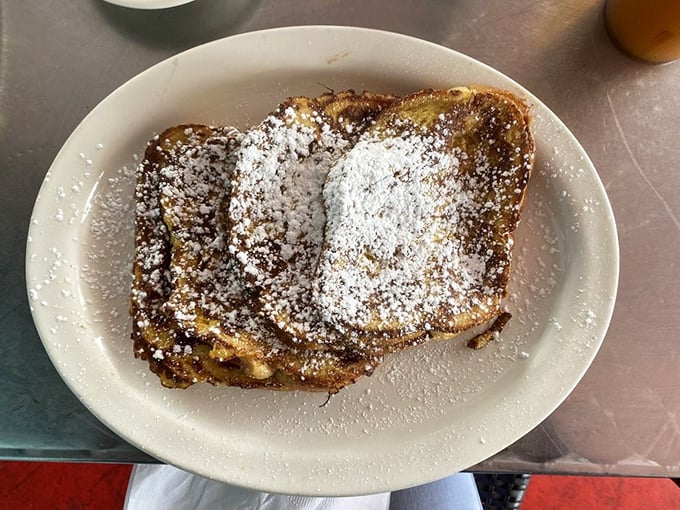 French toast so perfectly golden and dusted with powdered sugar, it's like the breakfast equivalent of finding a twenty in your old winter coat.
