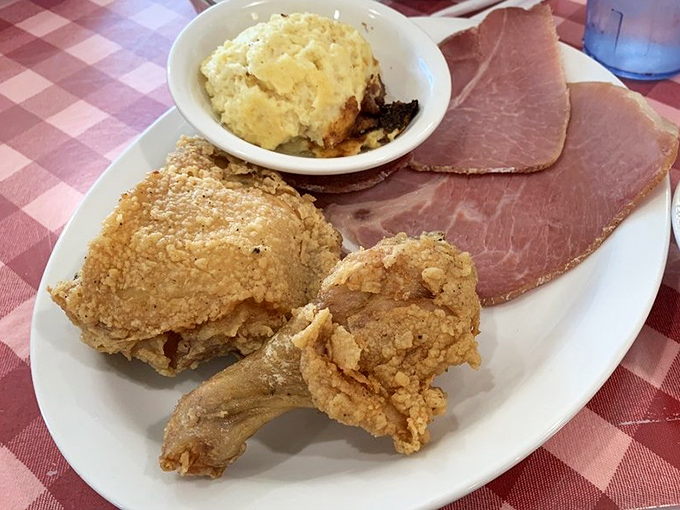 Golden-brown perfection meets plate. This fried chicken doesn't need fancy words—just napkins, because you'll be using your fingers.