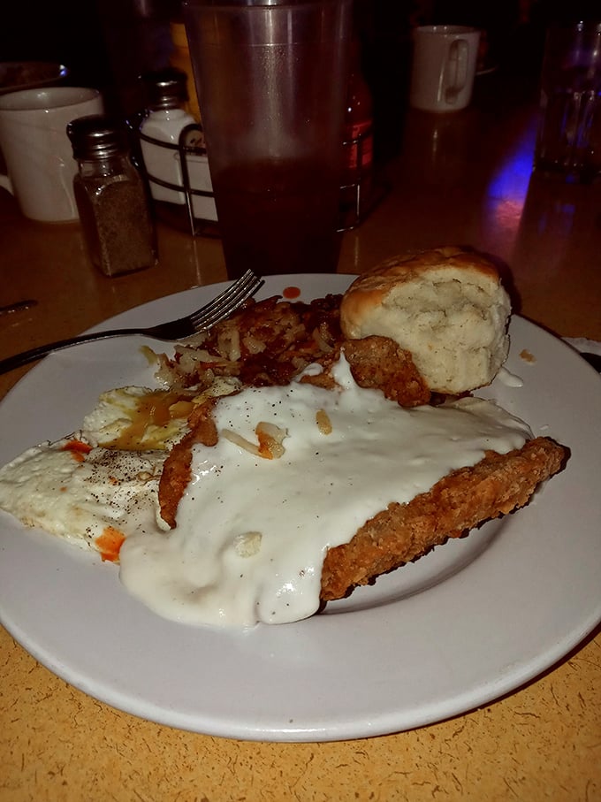 Country-fried comfort on a plate, smothered in gravy that your grandmother would approve of—if she were feeling particularly generous with her praise.