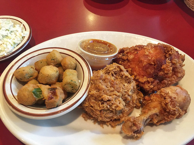 This fried chicken combo plate represents everything right with Southern cooking: crispy, juicy, and utterly soul-satisfying in every bite.