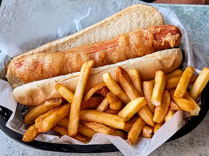 The infamous Salty Dog—a hot dog that took a daring plunge into the fryer and emerged as something gloriously, unapologetically indulgent.