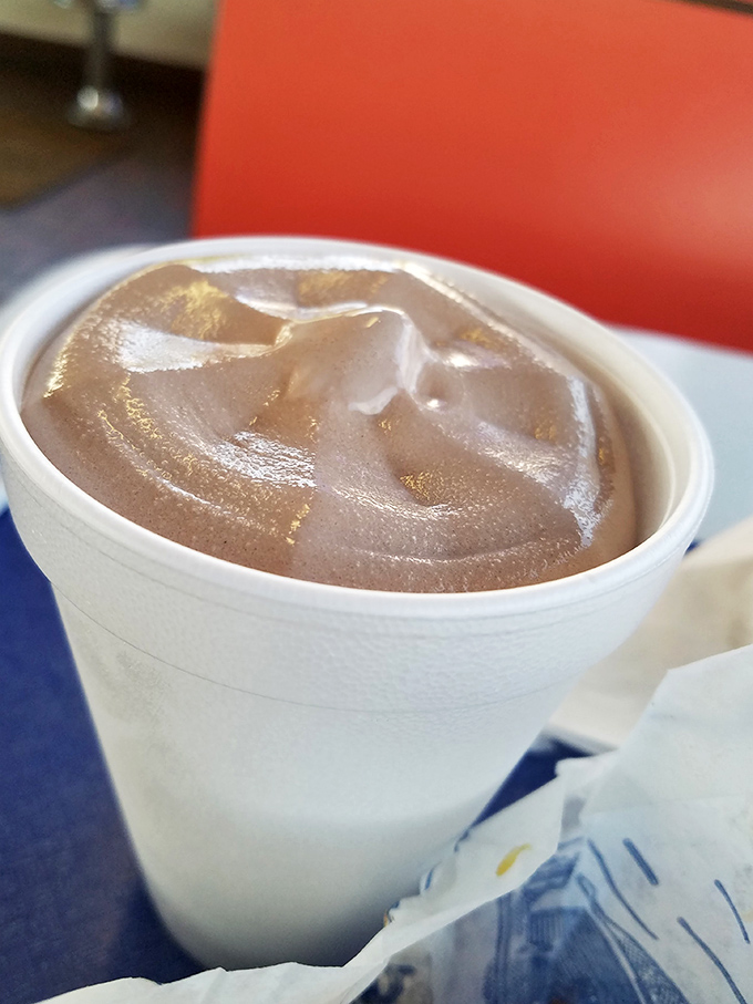 The frosted malt – requiring serious straw strength and even more serious willpower not to finish in thirty seconds flat. Thick enough to stand a spoon in, smooth enough to dream about.
